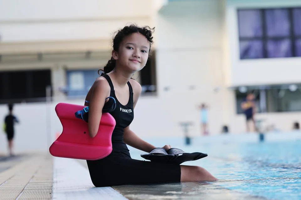 Missing part of her right arm does not limit Moza Baihakki’s golden ...