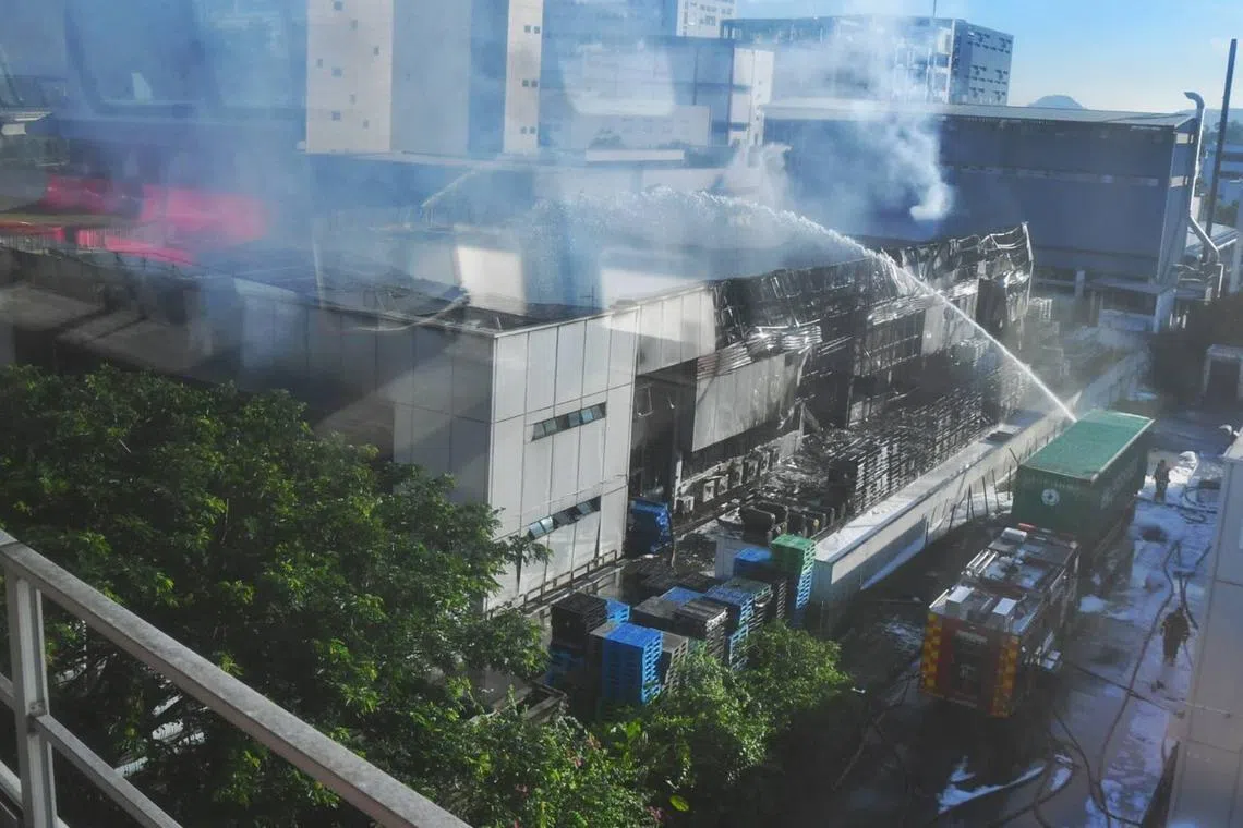 Huge fire in Tuas industrial building causes $10m in losses; MRT ...