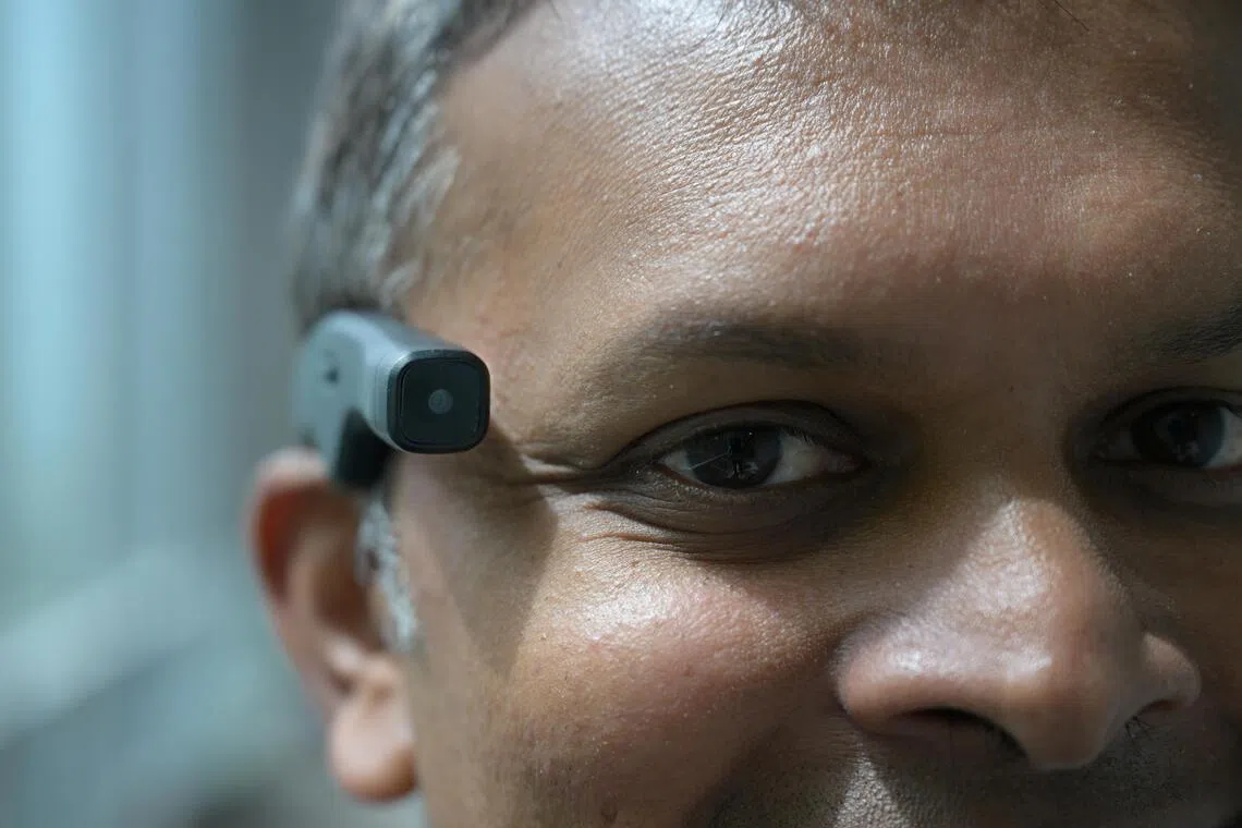 NUS team launches AI headset to help visually impaired commute, shop ...