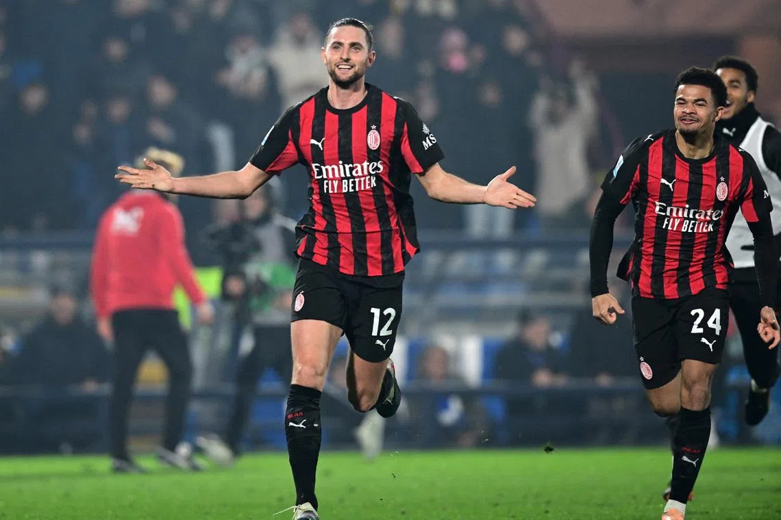 Rabiot double lifts Milan after early scare at Como | The Straits Times