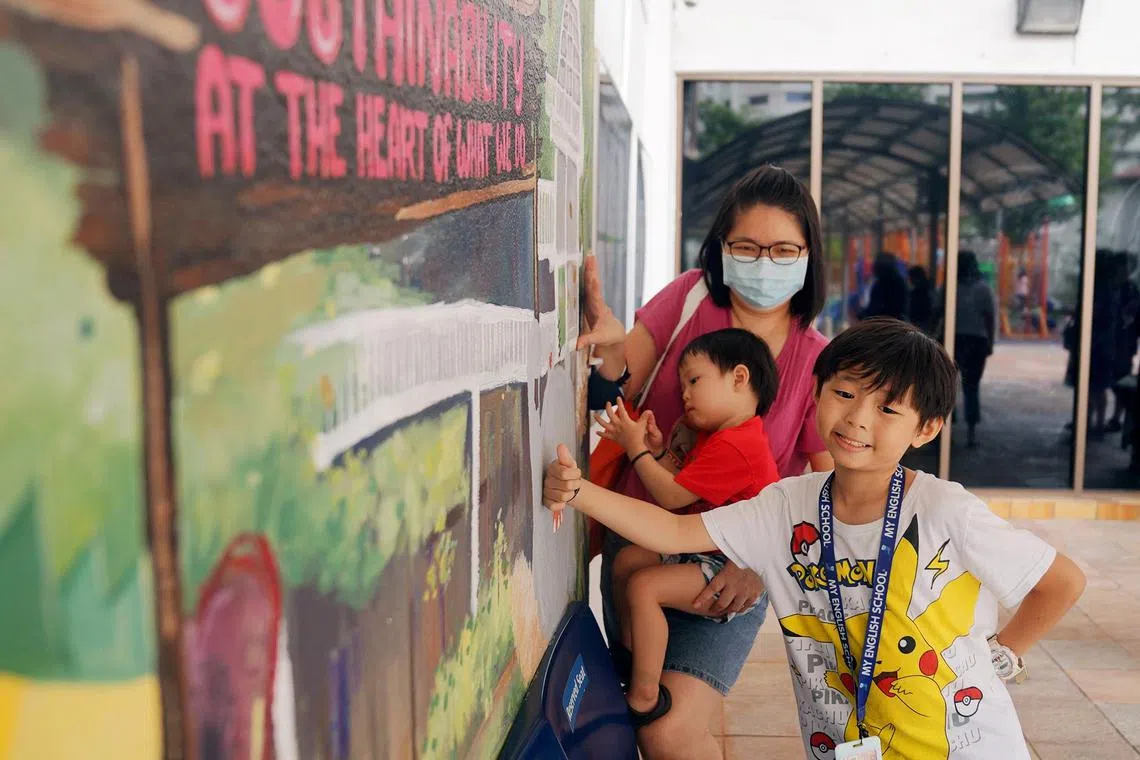 Nee Soon residents make their mark on Earth Day with thumbprints on 10 ...
