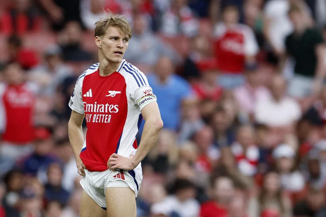Arsenal must ‘stick together’ in PSG showdown: Martin Odegaard | The Straits Times