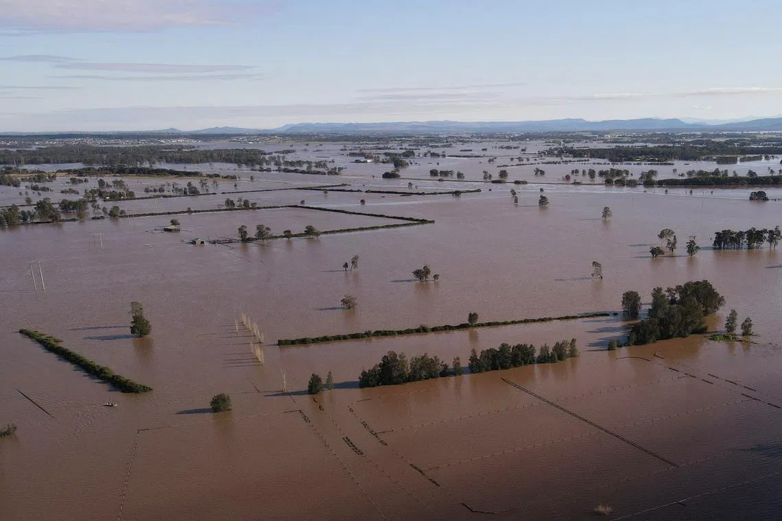 Australia begins clean-up after floods kill 5, damage 10,000 properties ...