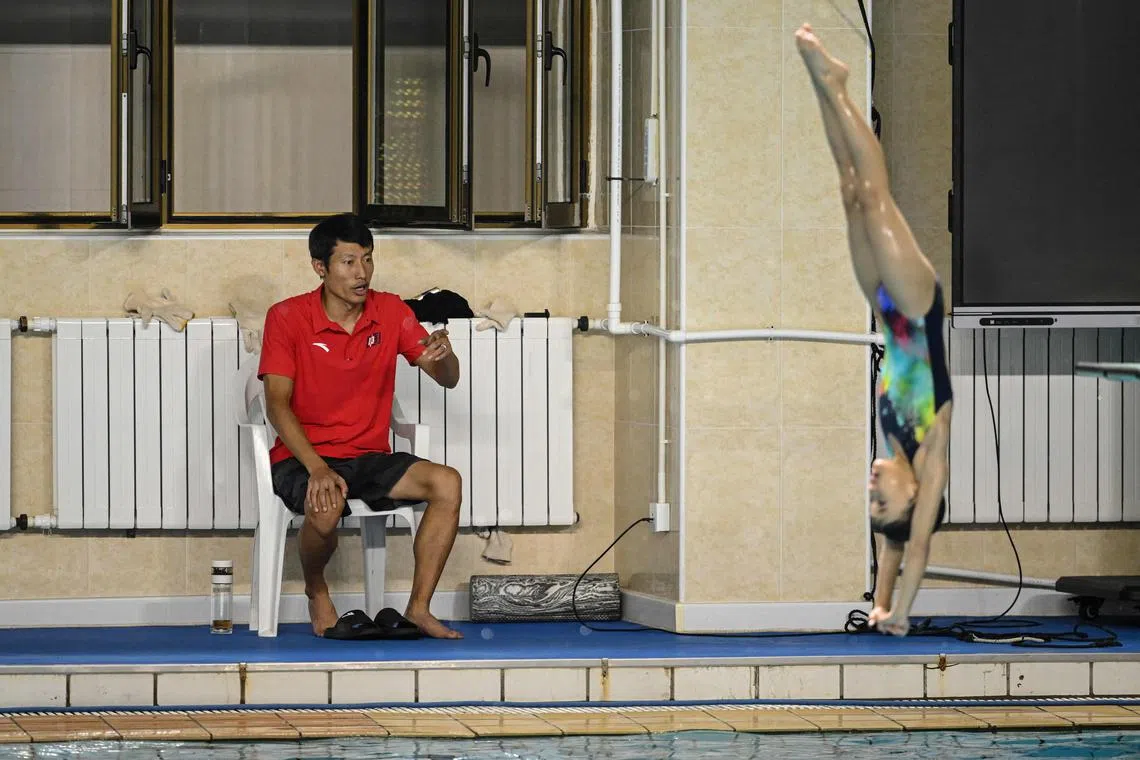 China’s Olympic divers inspire next generation at Beijing pool | The ...