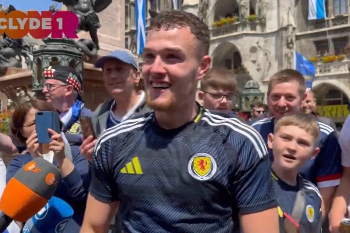 Scotland fan who walked from Glasgow gets hero's welcome in Munich ...