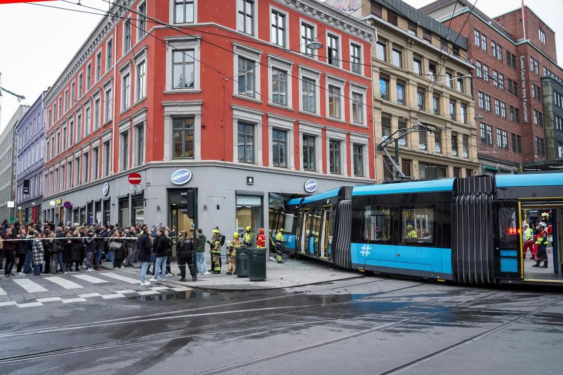Tram derails and crashes into store in central Oslo, injuring four ...