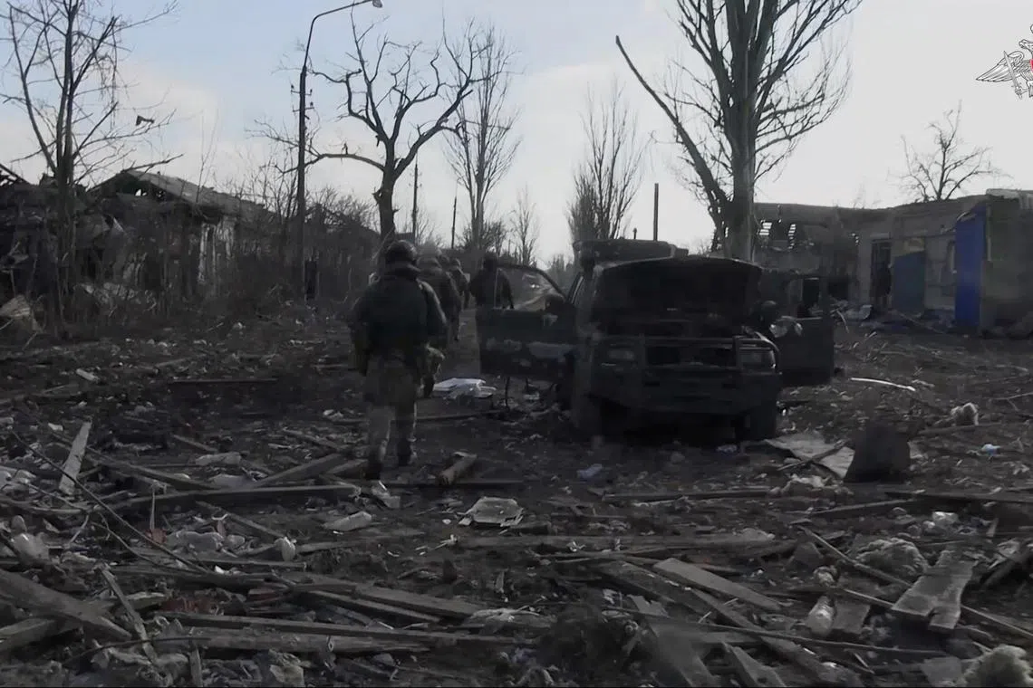Russia says its forces push further west after taking Ukraine's ...