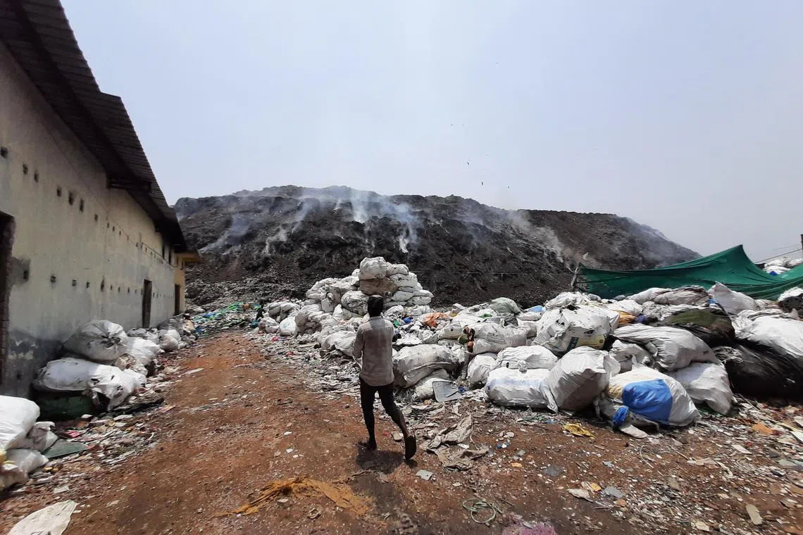 New Delhi vows to flatten monster garbage pile in Indian capital | The ...