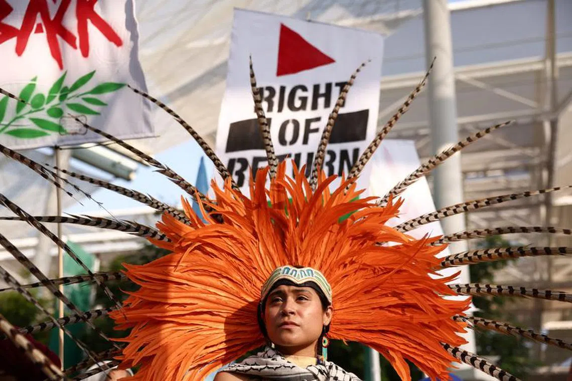 Activists stage rare UAE politics protest during COP28 climate summit ...