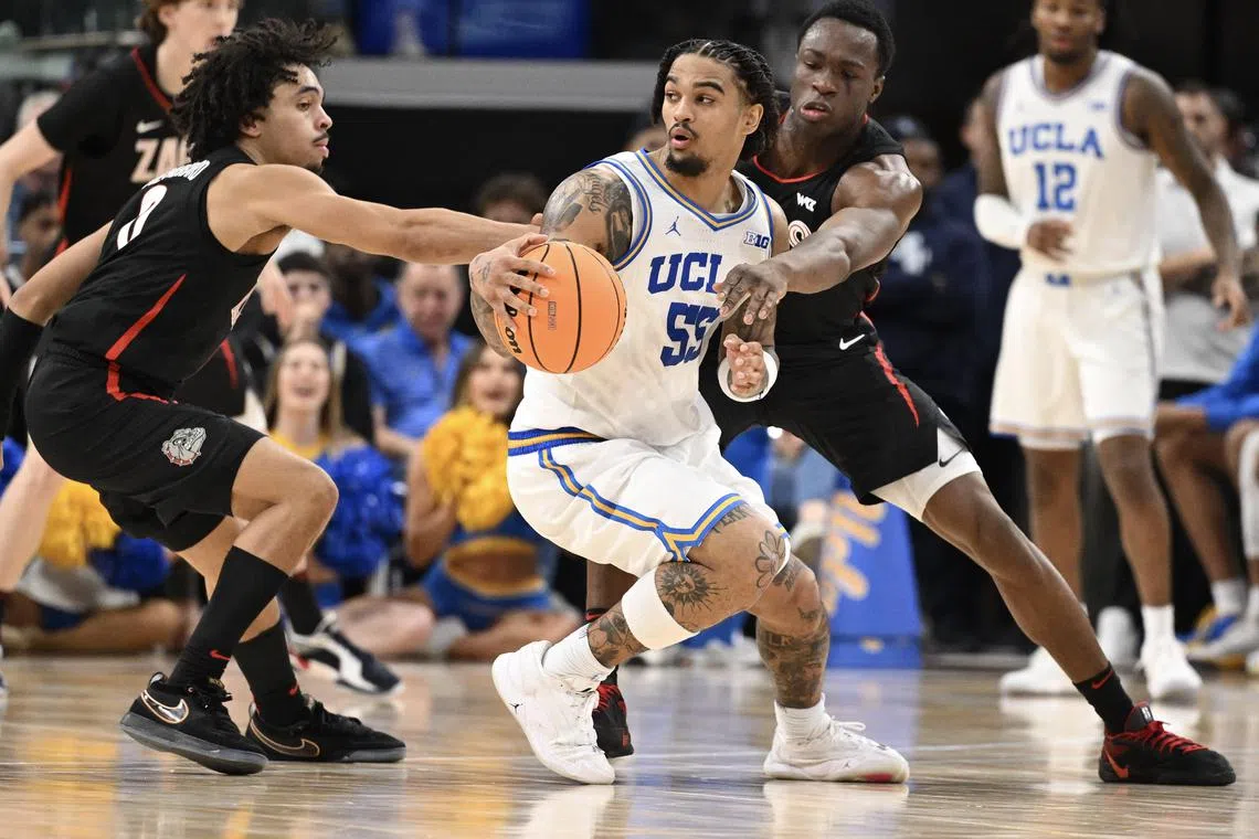 UCLA makes big jump as top 13 remain unchanged | The Straits Times
