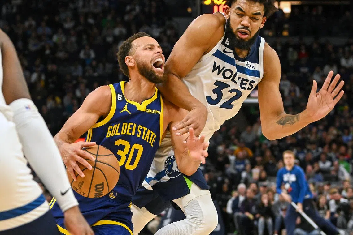 NBA: Stephen Curry leads first-quarter barrage as Warriors down Wolves ...