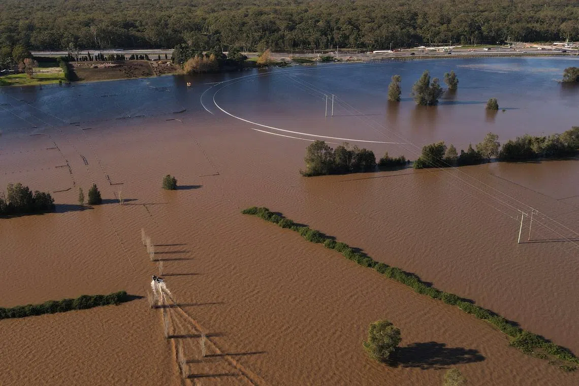 Australian authorities airdrop supplies to farmers stranded by flood ...