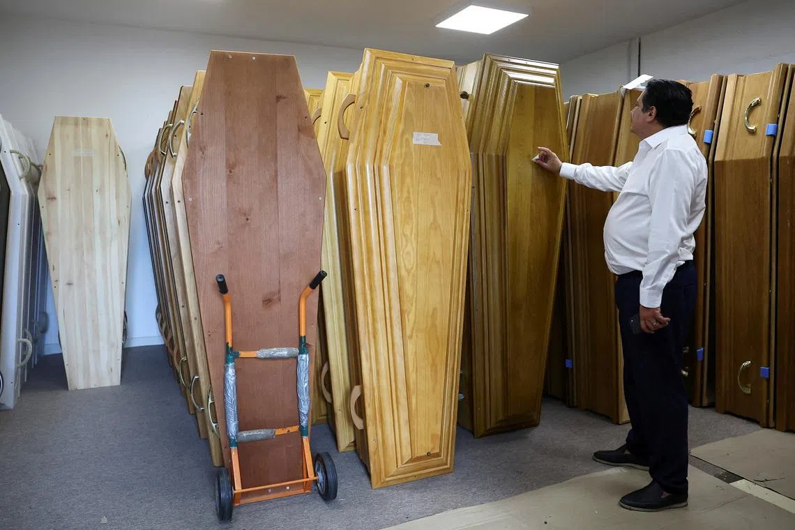 In France, a funeral home is overwhelmed as the heatwave's death toll ...