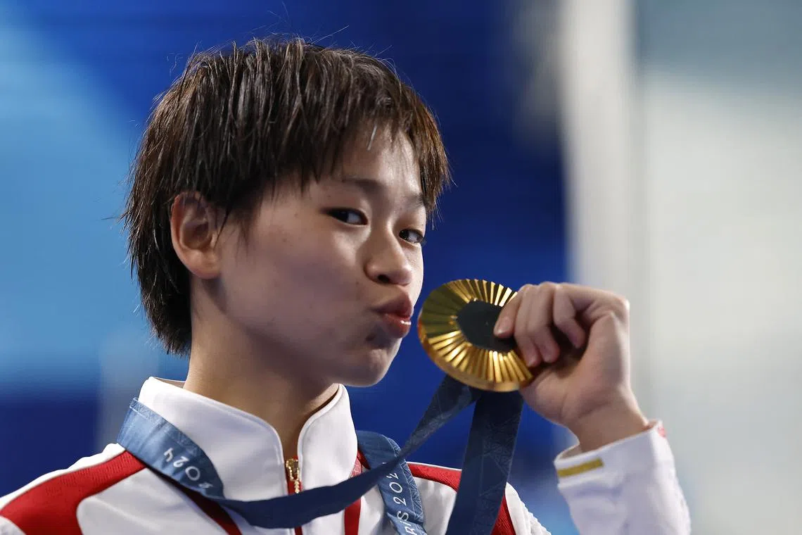Diving-China's Quan's thoughts turn to food after winning 10-metre ...
