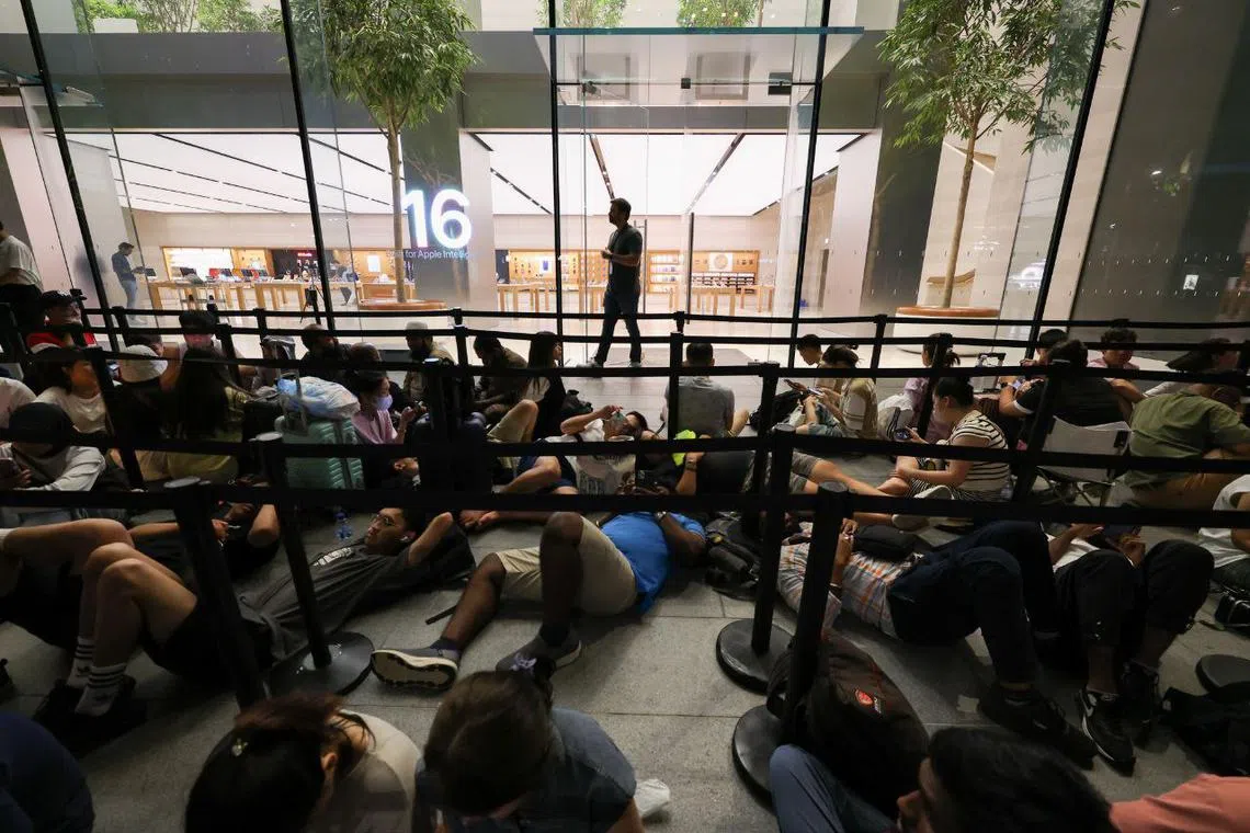 Apple’s iPhone 16 launches to cheers and applause as hundreds queue ...