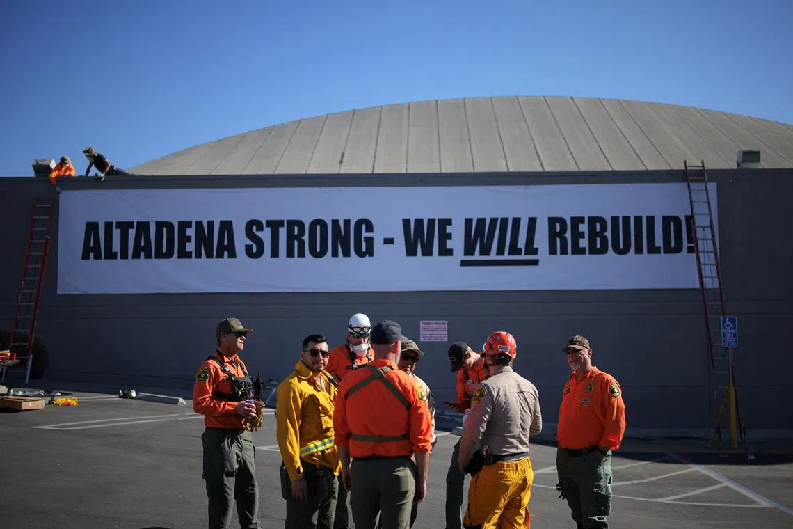 Los Angeles wildfires rage as strong winds put millions at risk | The ...