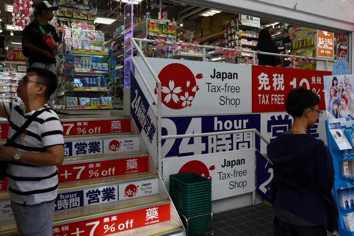 Tax-free sales at Japan department stores drop as foreign tourists curb ...