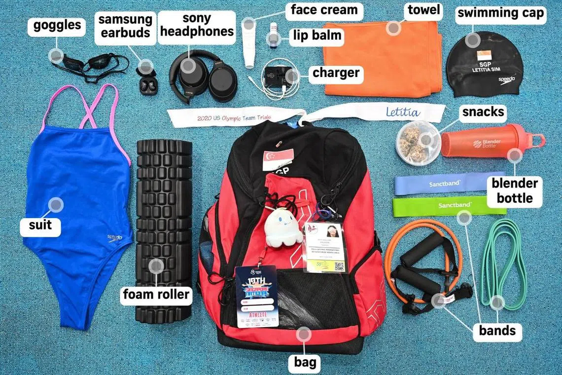 Swimmers Letitia Sim and Jonathan Tan like to pack early and light for ...