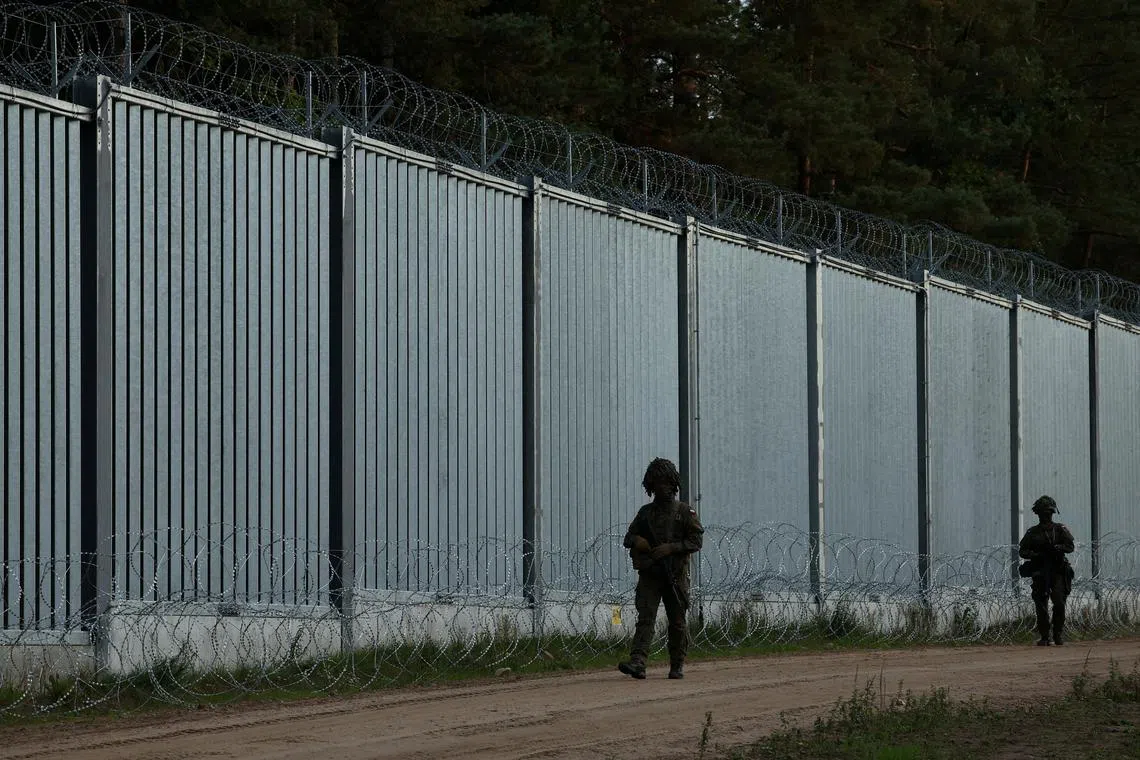 Poland to start controls on borders with Germany, Lithuania over migration | The Straits Times