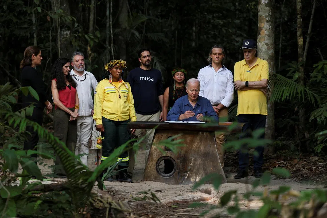 Biden visits Amazon rainforest en route to G20 summit in Rio | The ...