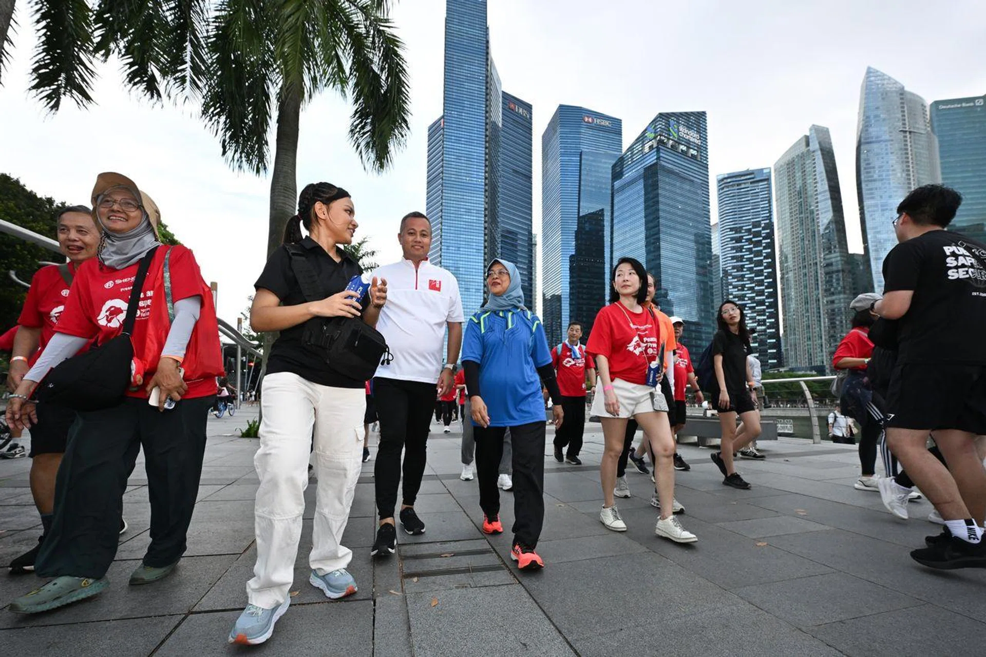 Former security officer surprises Halimah Yacob at walkathon | The New ...