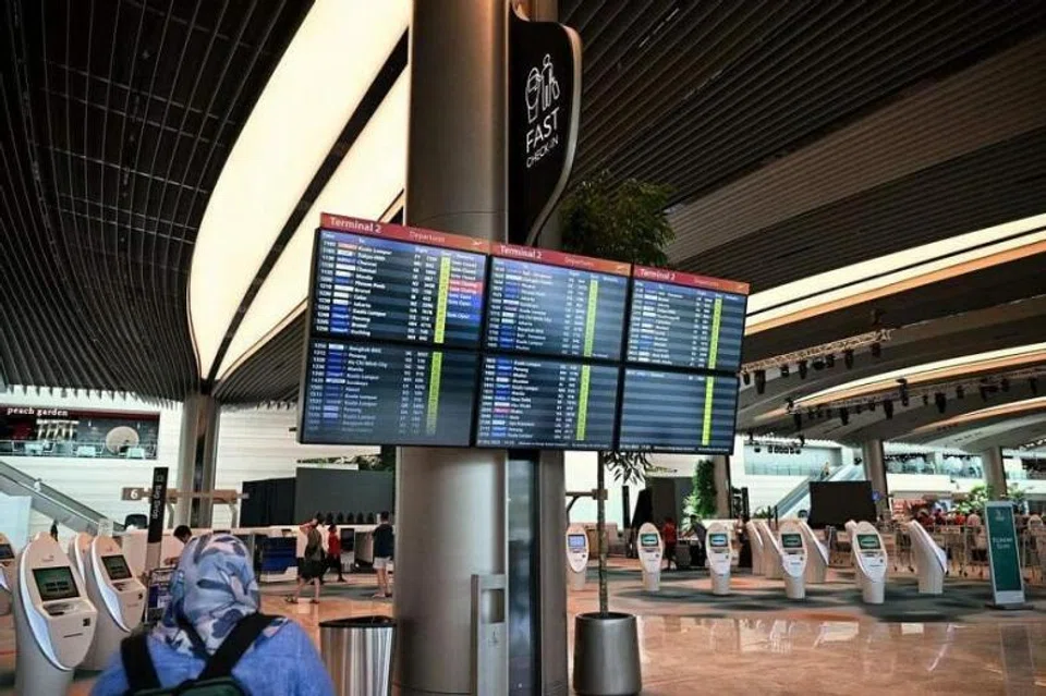 Changi Airport T2 reopens fully with 4-storey waterfall display, new ...