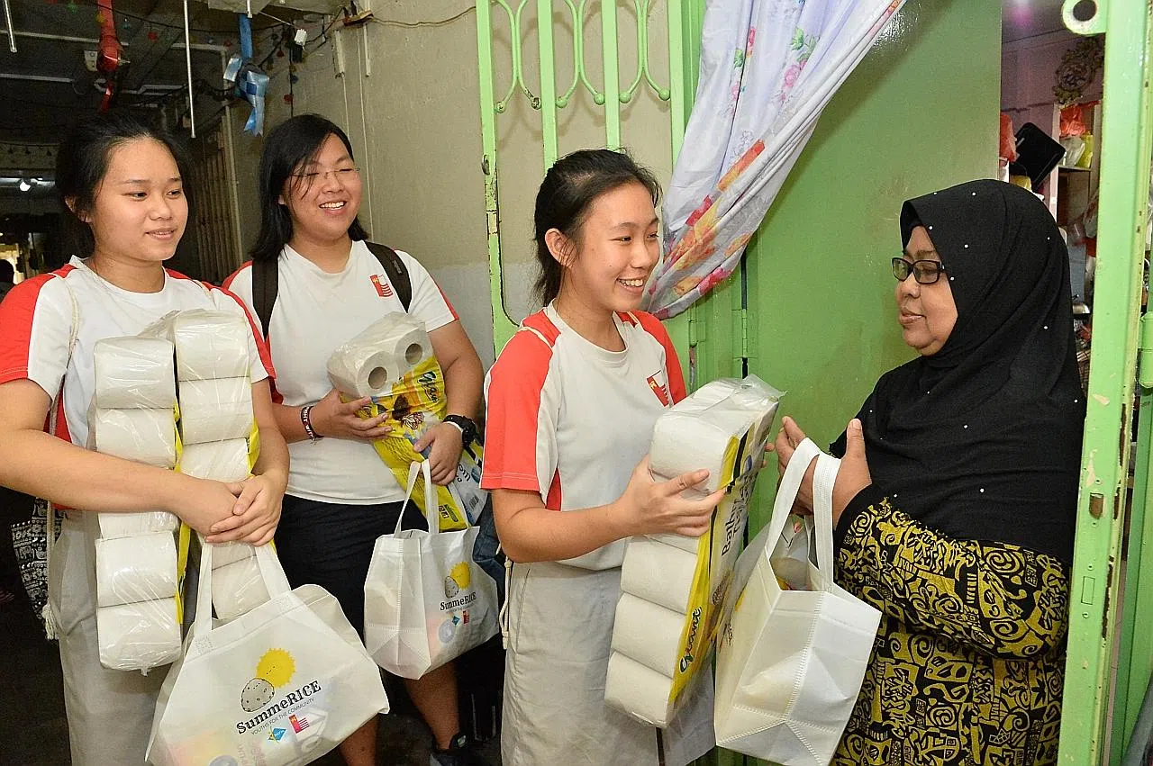 NJC students give out welfare packs to 5,000 households | The New Paper