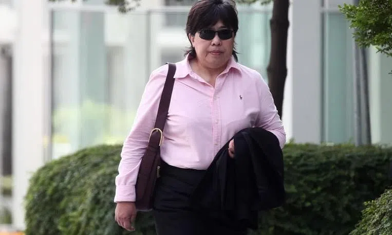 'Badge Lady' charged over not wearing mask in Ion Orchard | The New Paper