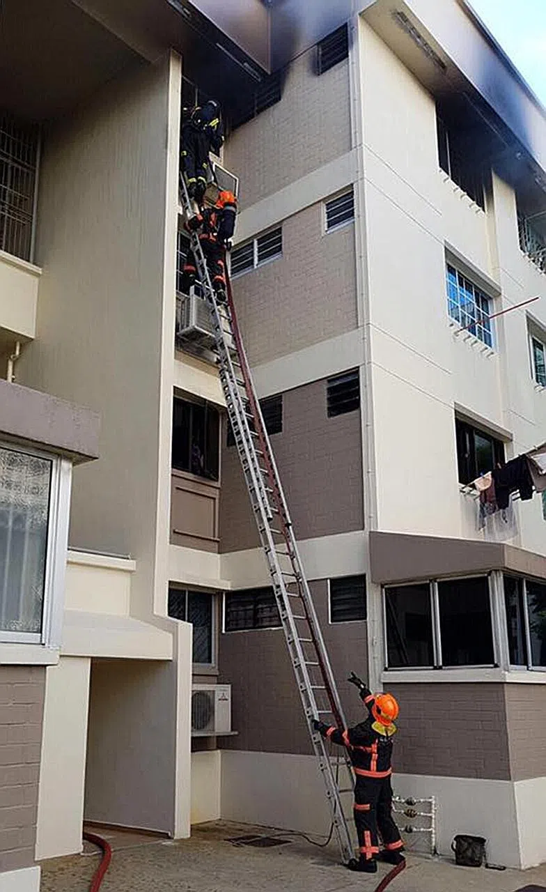 Fire victim trapped on ledge rescued | The New Paper