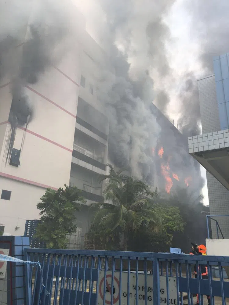 'Raging' fire at CK Building at Tampines | The New Paper