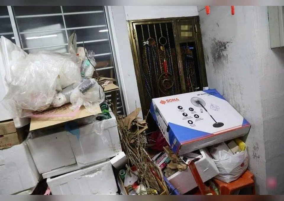 Hougang hoarder climbs through window to get into flat | The New Paper