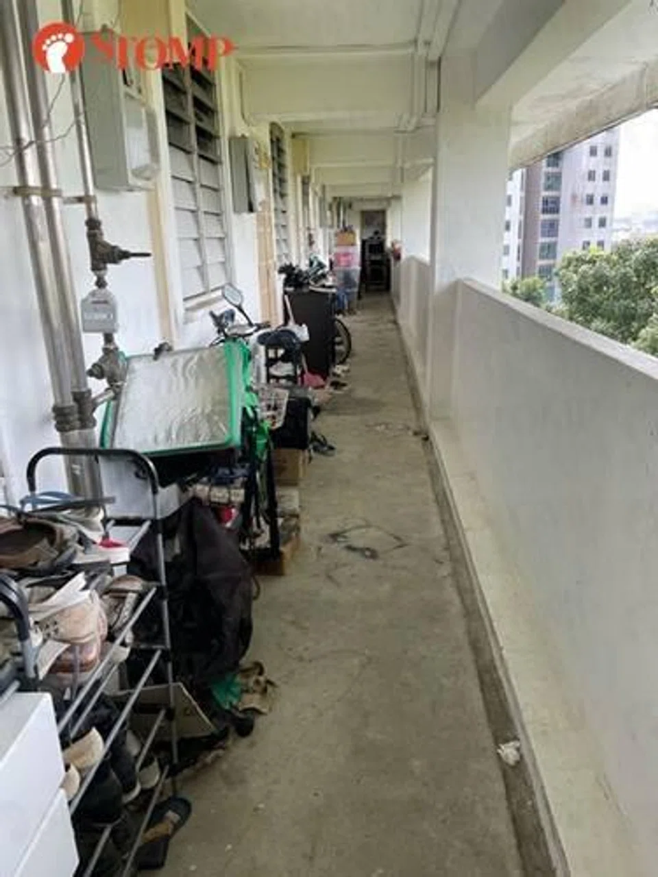 Clutter at Boon Lay HDB corridor..., Latest News - The New Paper