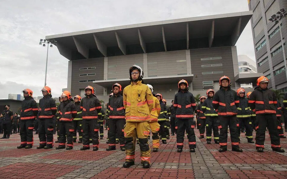 Fallen NSF firefighter Edward Go promoted; SCDF holds observance ...