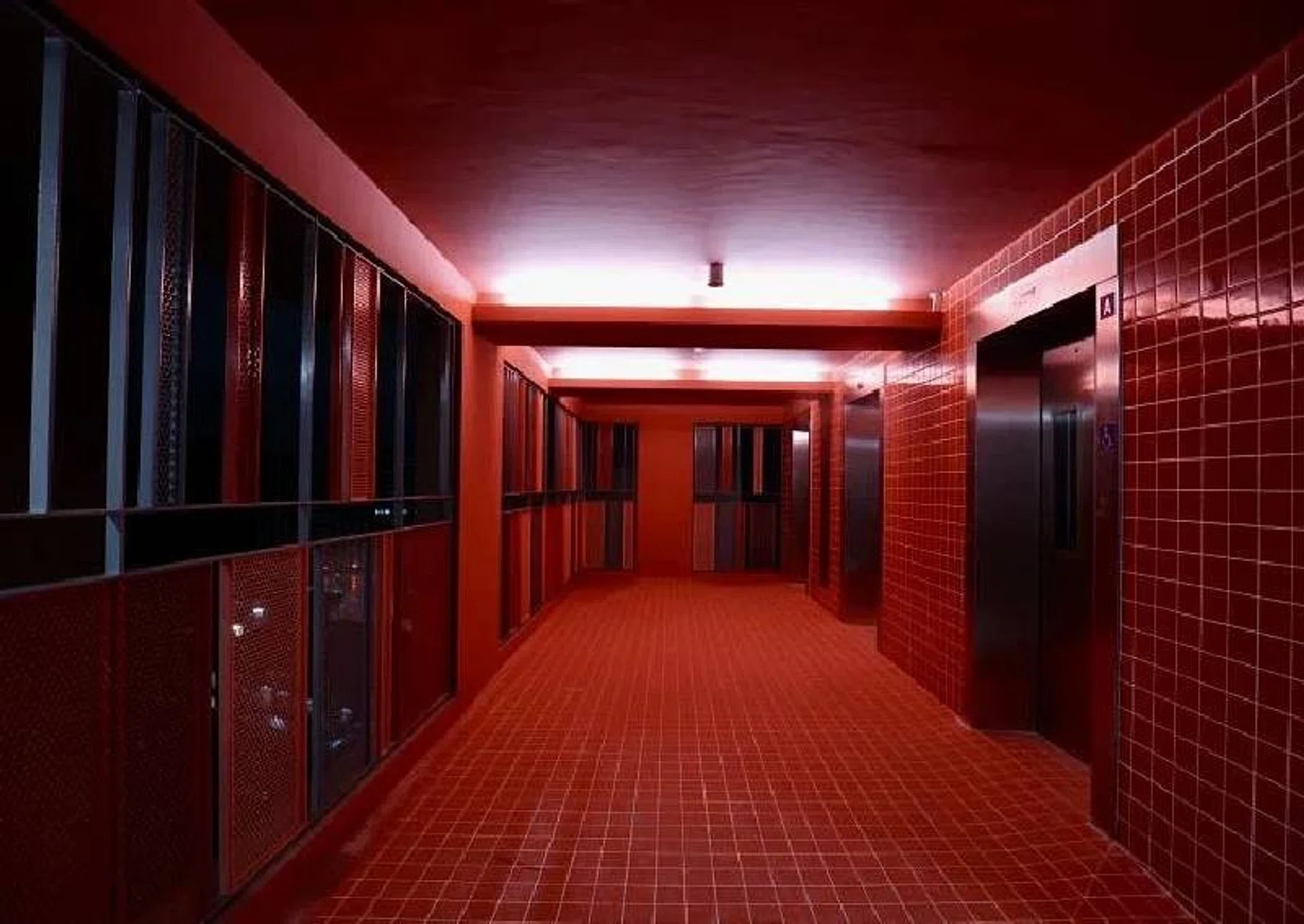 Residents spooked by eerie red-themed HDB block | The New Paper