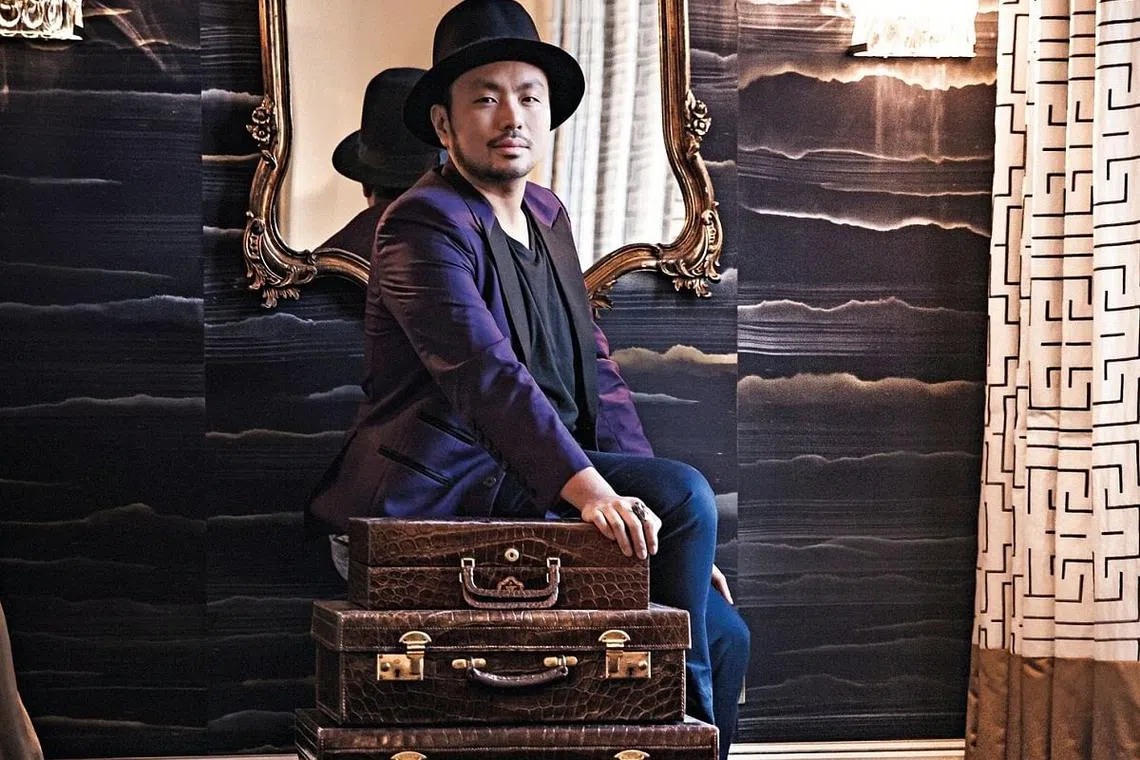 Founder and designer Ethan K flies the Singapore flag with his ultra ...