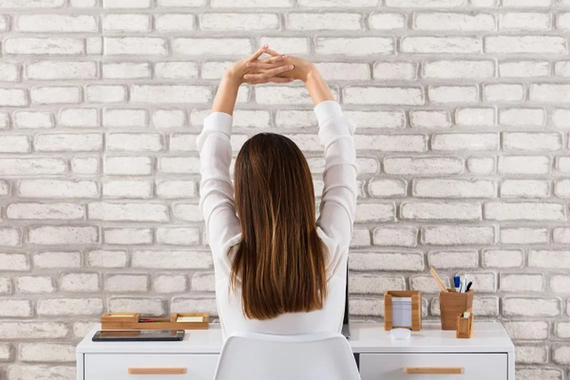 5 Easy Stretches To Relieve Aches And Pains After A Long Work Day - The ...